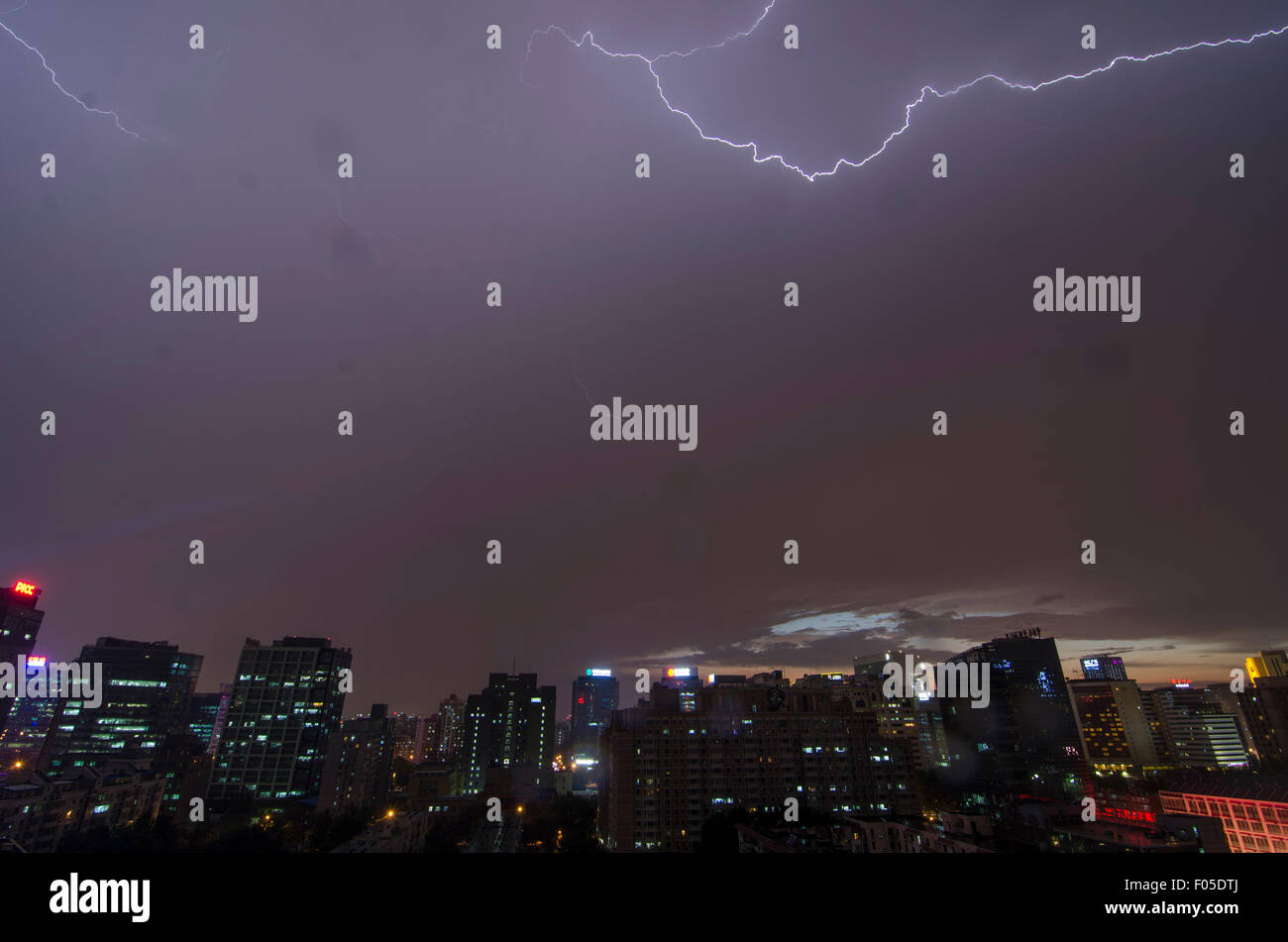 The sky is engulfed in lightning flashes and bolts criss-crossing the ...