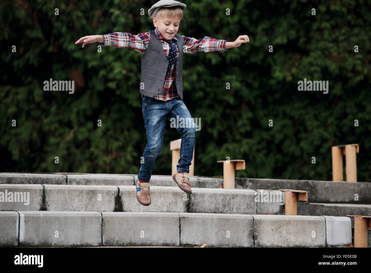 little boy jumping on the stairs Stock Photo - Alamy