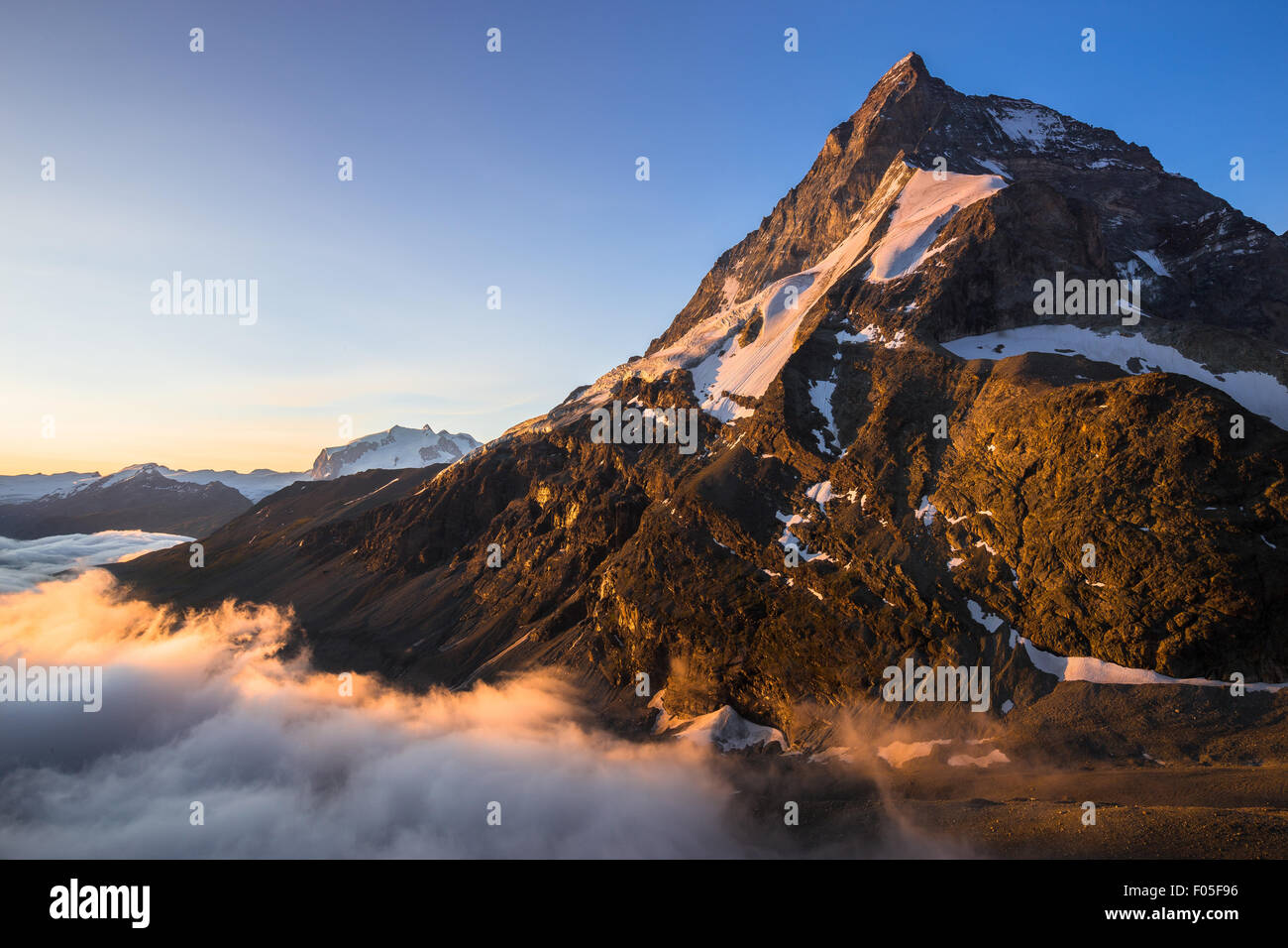 Alpenglow at sunrise on Matterhorn (Cervino) mountain. The north-west ...