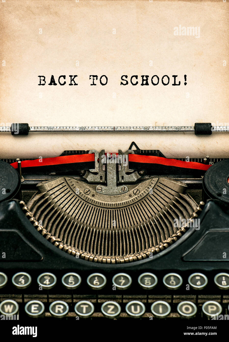 Antique typewriter with aged textured paper sheet. Sample text Back to ...