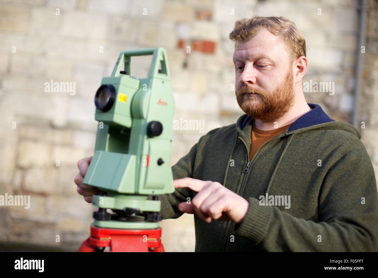 archaeology student with mapping device Stock Photo - Alamy