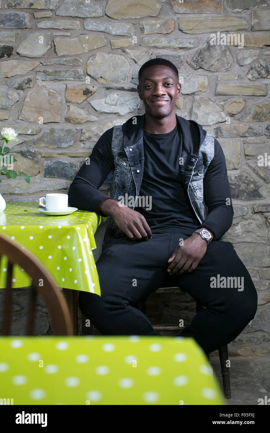 Portrait of footballer Marvin Sordell in a tea room Stock Photo - Alamy