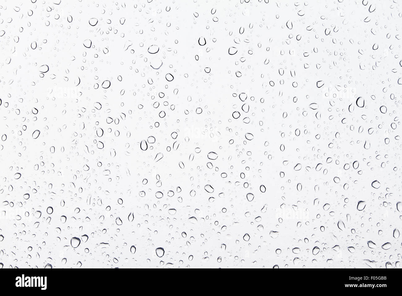 Rain drops on glass as a background and texture Stock Photo - Alamy