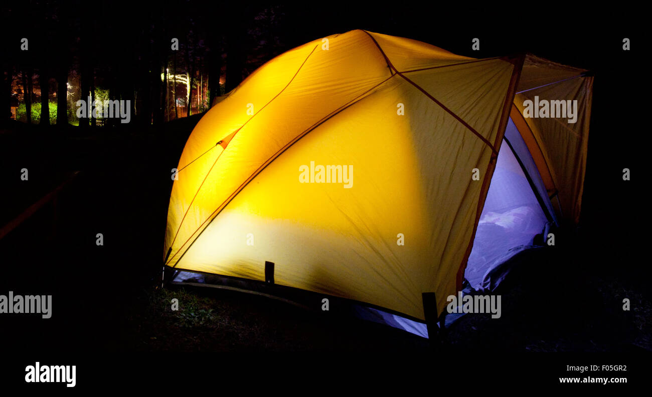 Tent at night with lights on inside Stock Photo - Alamy