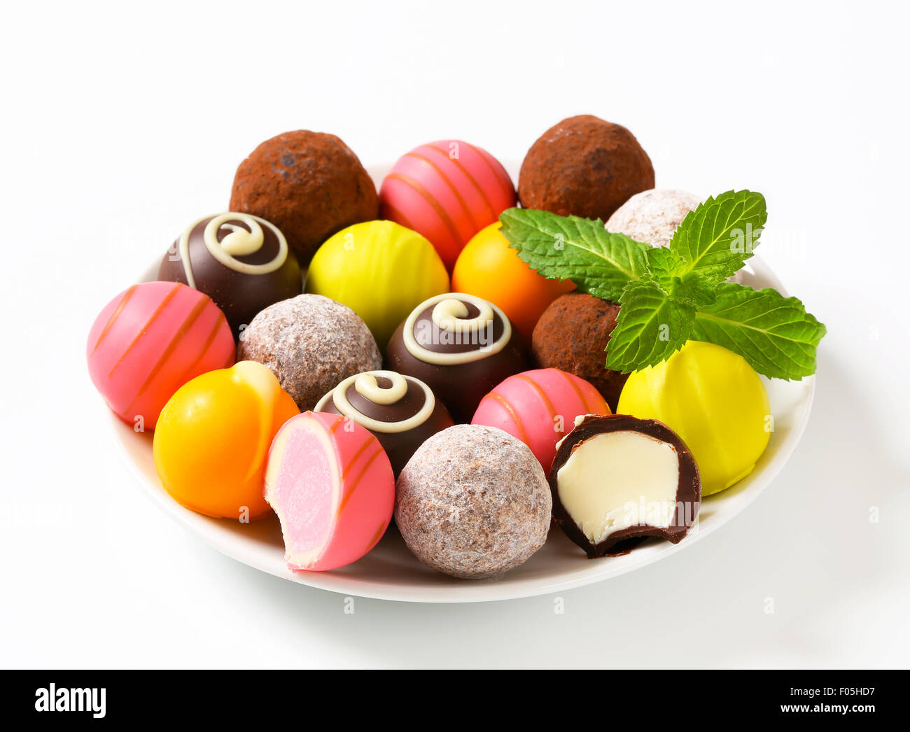 Assorted chocolate truffles and fruit ganache pralines Stock Photo - Alamy