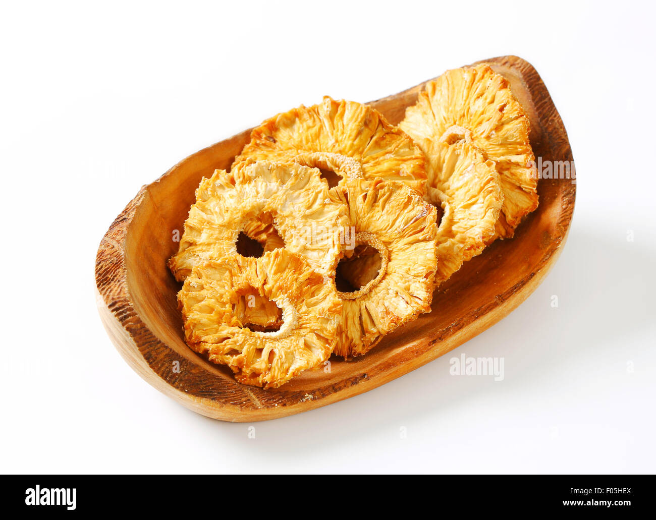 Dried pineapple rings - studio shot Stock Photo - Alamy