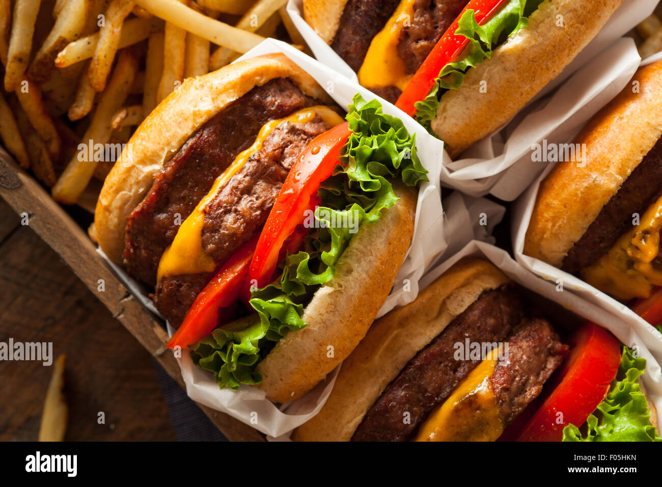 Double cheeseburger fries hi-res stock photography and images - Alamy
