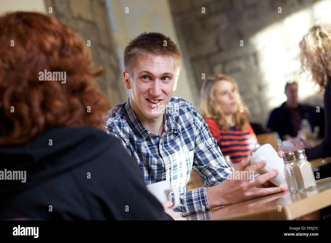 university students socialising in the cafeteria Stock Photo - Alamy