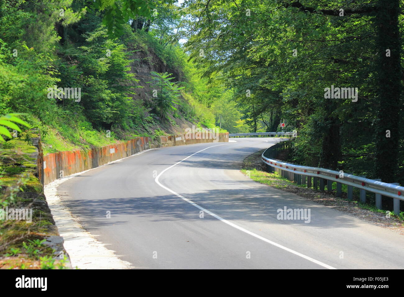 Mountain twisting road Stock Photo - Alamy