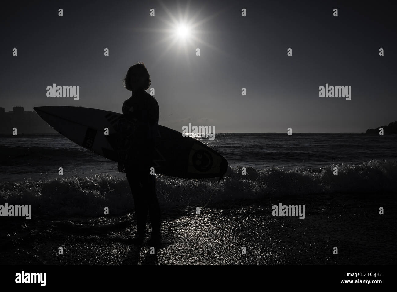 Surfer Pablo Macineira holding surfboard. Orzan Beach. A Coruna ...
