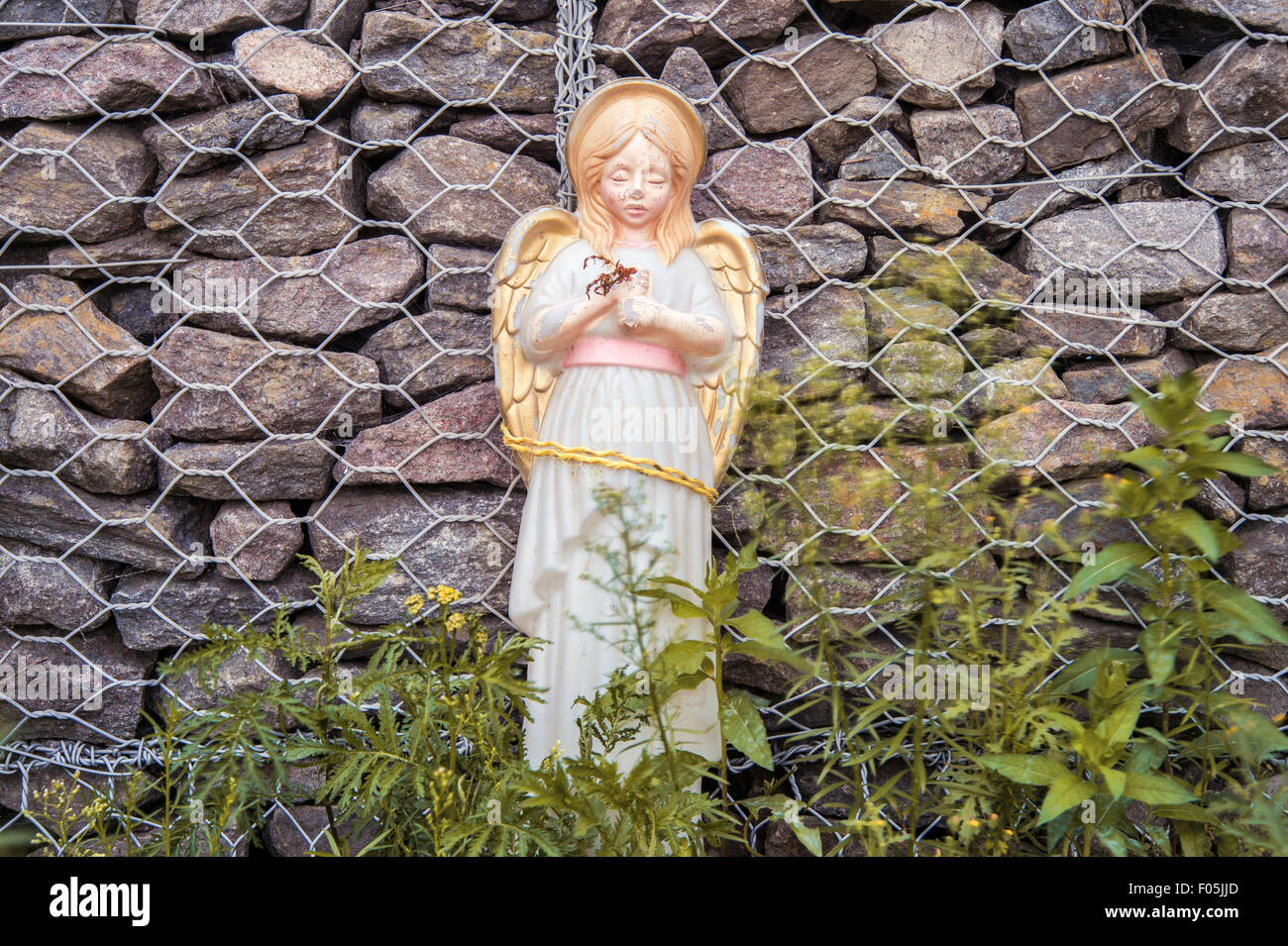 Beautiful angel Statue in Montreal, near St-Lawrence river Stock Photo ...