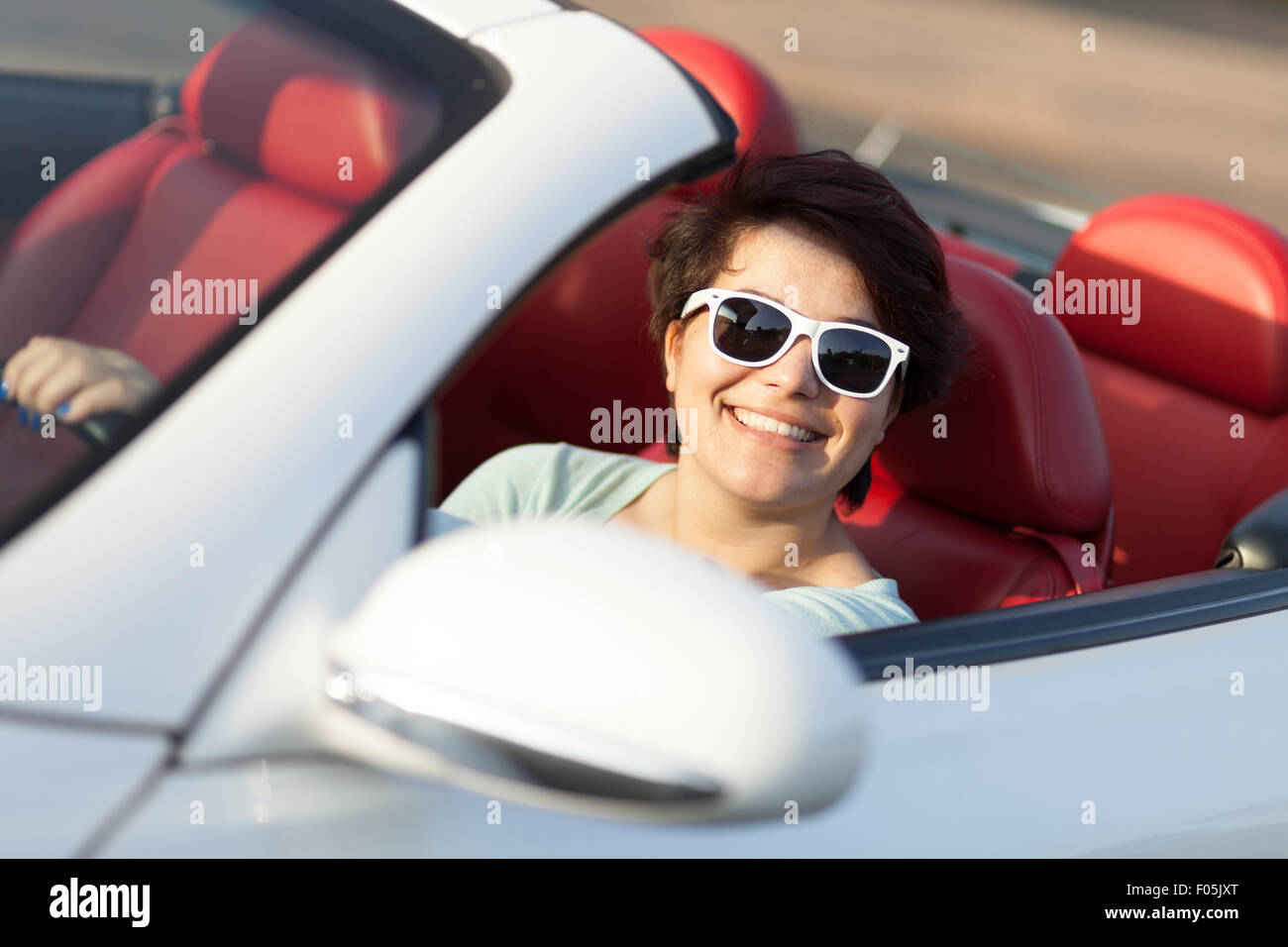 Woman Driving a Convertible Stock Photo - Alamy