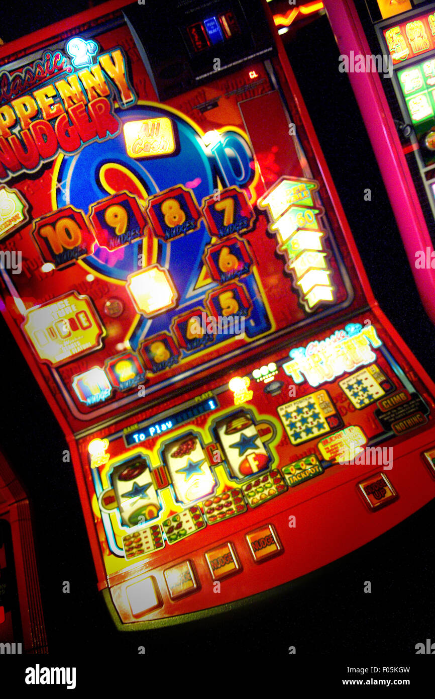 Slot machines / One armed bandits in arcade Stock Photo - Alamy