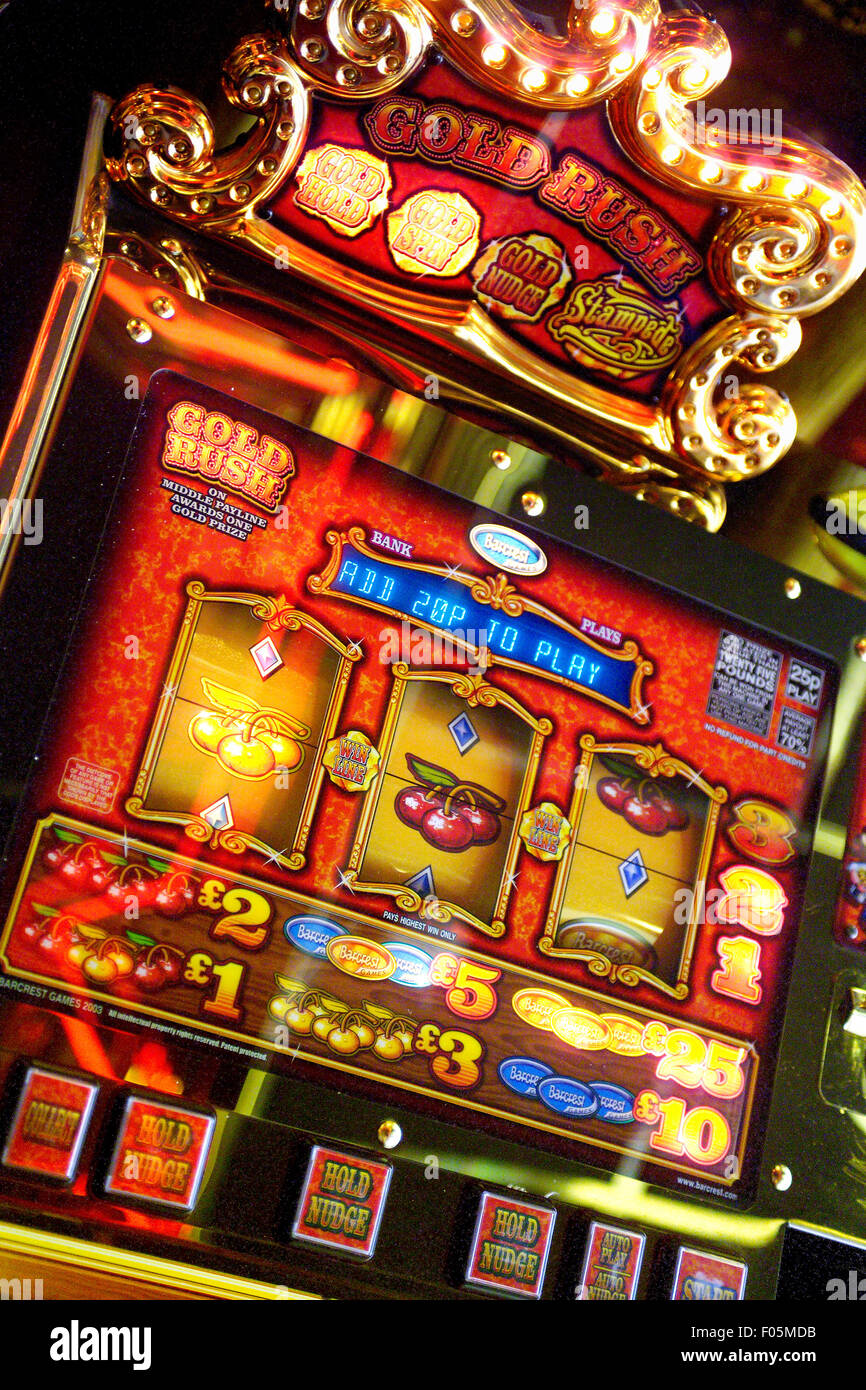 Slot machines / One armed bandits in arcade Stock Photo - Alamy