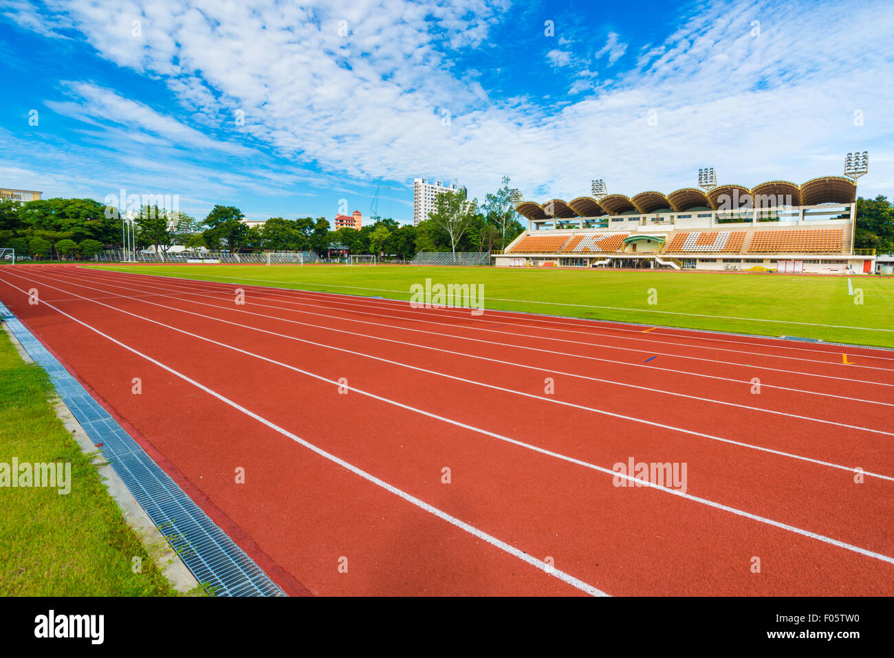 Running track in stadium against blusky, Colourful sport Stock Photo ...