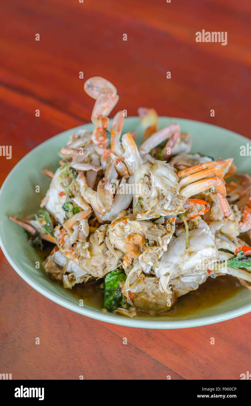 Stir fried Crab with chili & Basil leaves , spicy seafood dish Stock ...