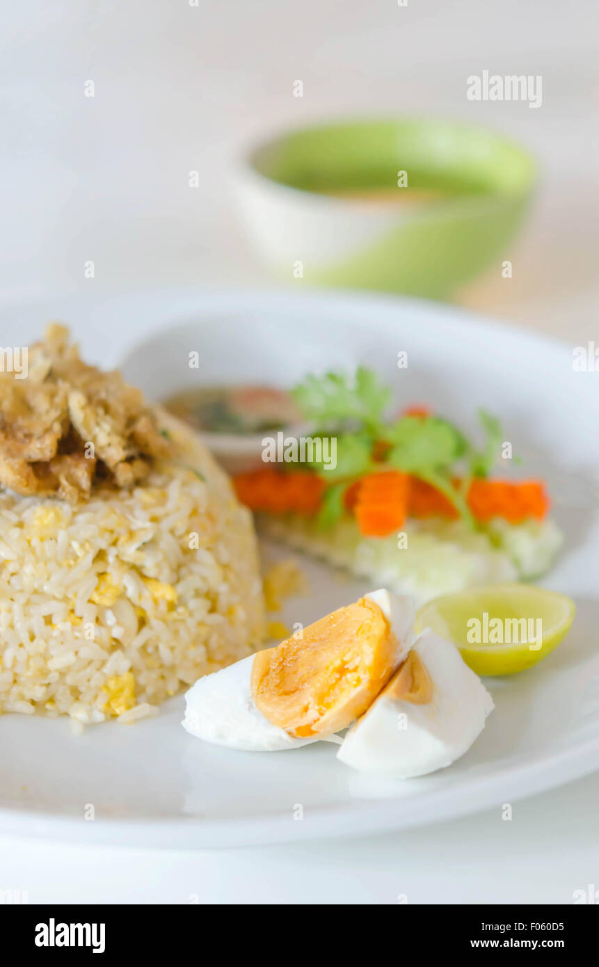 Chinese cuisine, fried rice with fish , salted egg and fresh vegetable ...