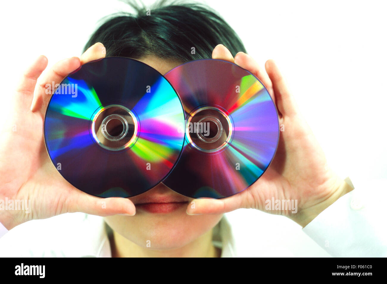 Hand holding up dvd cd hi-res stock photography and images - Alamy