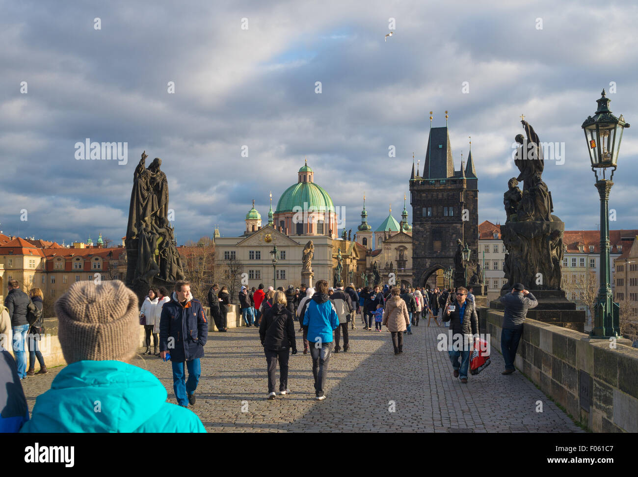 Unknown tourists on the famous charles bridge. It is a famous historic ...