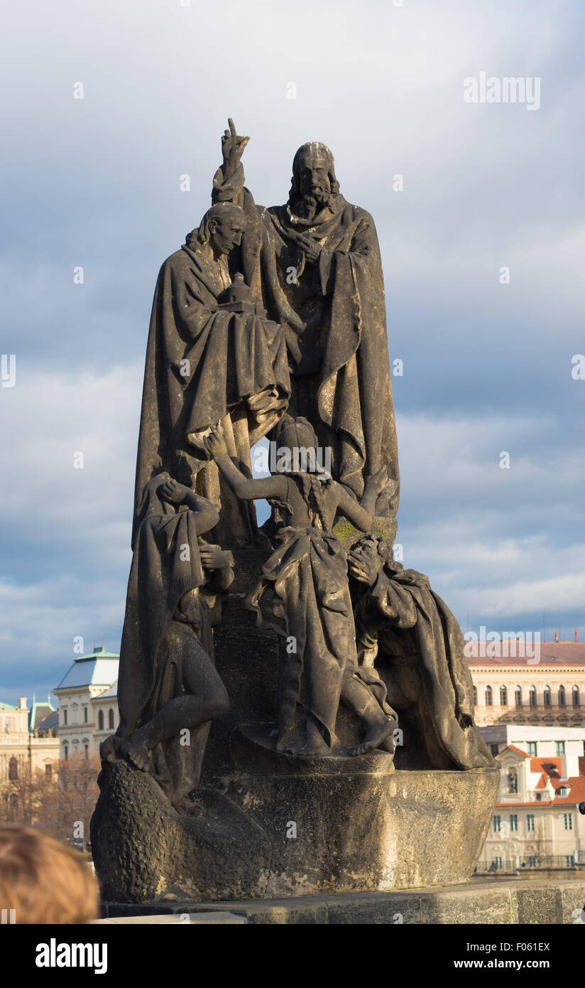 Religious statue on the famous Charles bridge in Prague. The bridge is ...