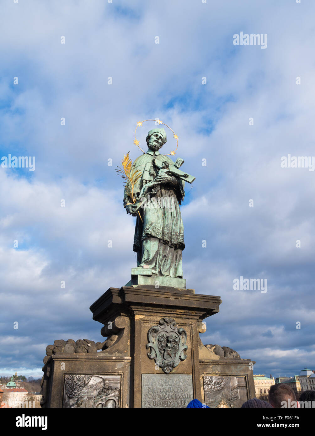 Religious statue on the famous Charles bridge in Prague. The bridge is ...