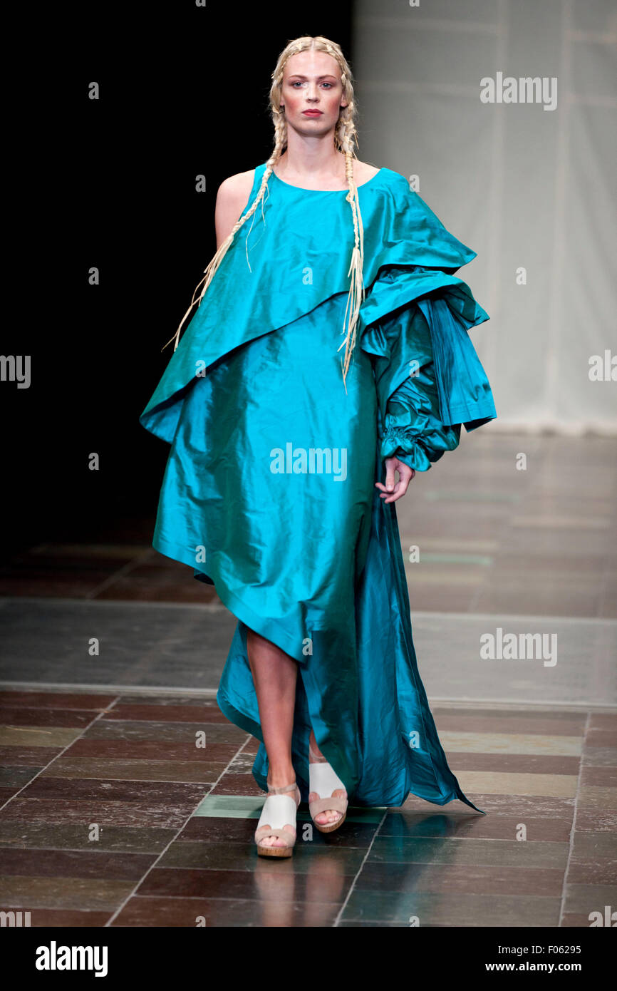 Copenhagen, Denmark, August 7th, 2015. A model walks the runway wearing ...