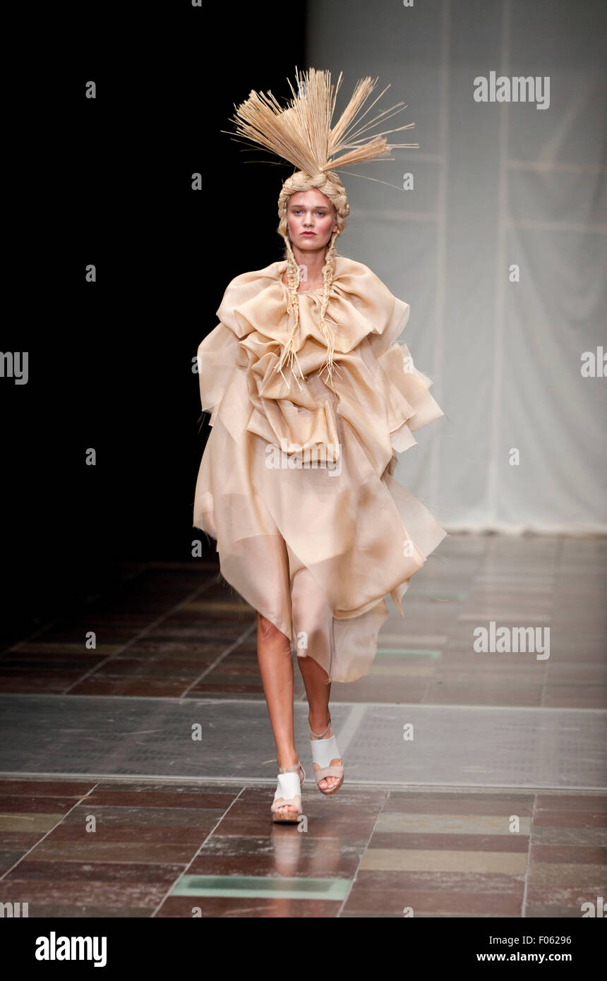 Copenhagen, Denmark, August 7th, 2015. A model walks the runway wearing ...