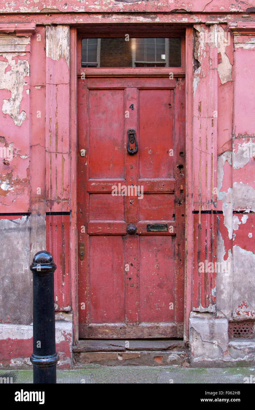 Faded red door Stock Photo - Alamy