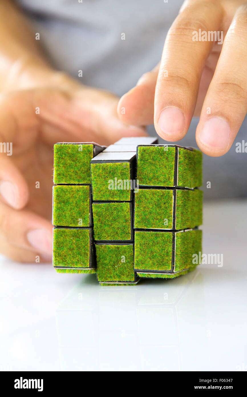Green rubik's cube concept Stock Photo - Alamy