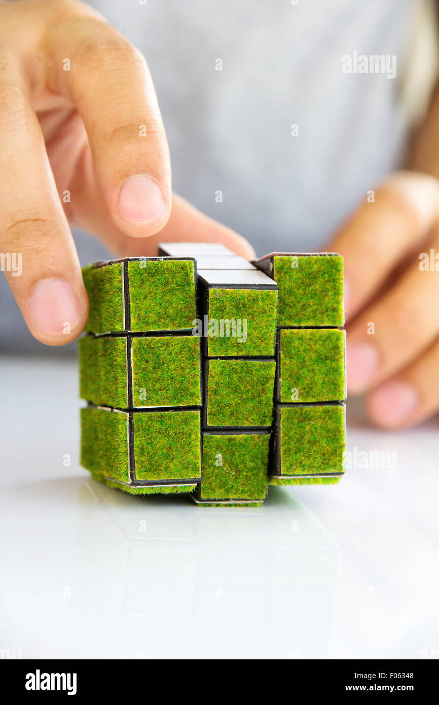 Green rubik's cube concept Stock Photo - Alamy