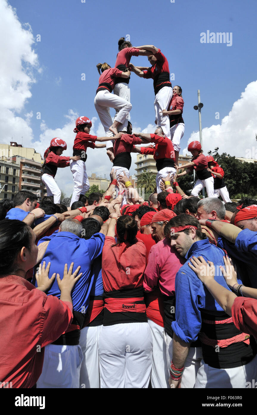 Castellers, human traditional tower next to the Sagrada Familia temple ...