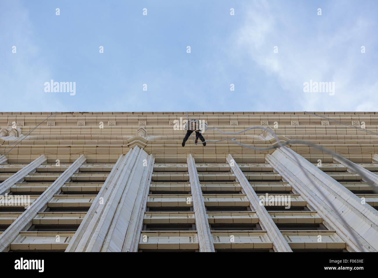 Man climbing window hi-res stock photography and images - Alamy