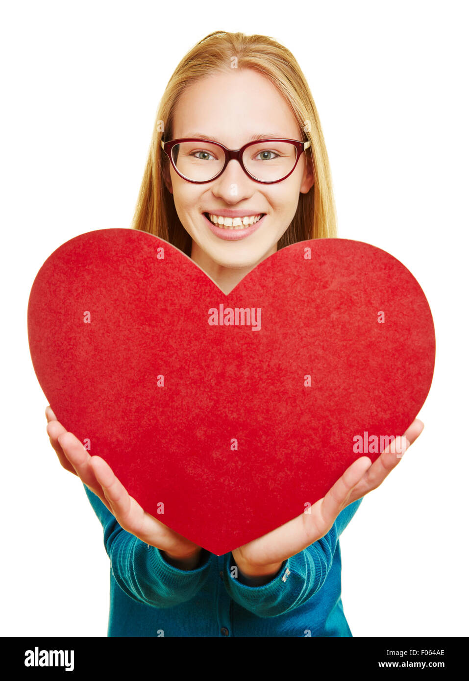 Young Woman Holding Big Red Heart As Sign Of Love In Her Hands Stock