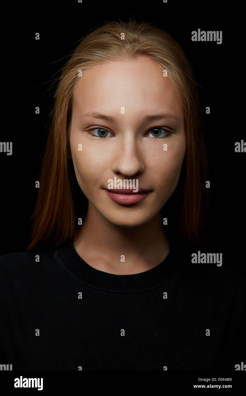 Front view of smiling young attractive blonde woman Stock Photo - Alamy