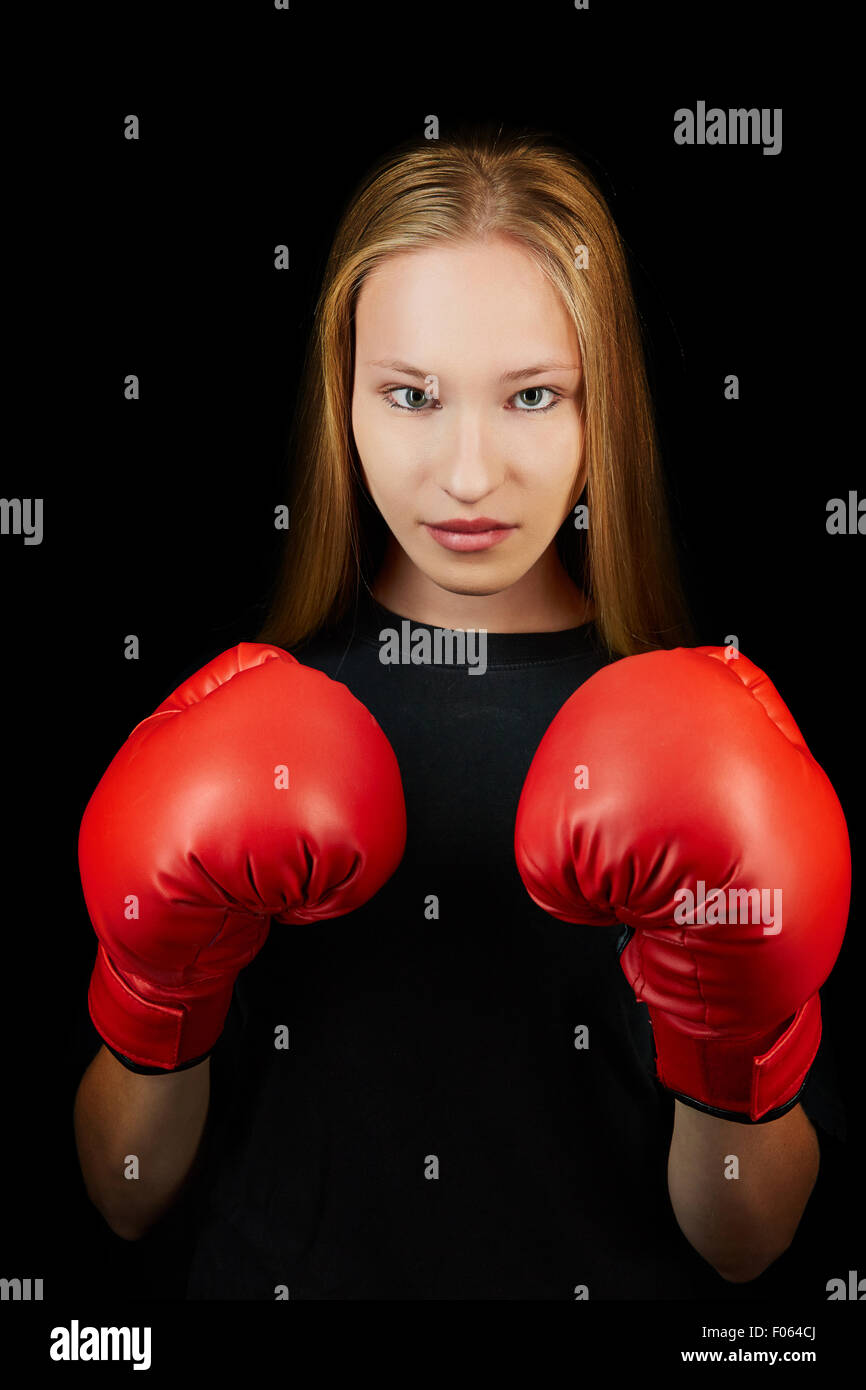 Young blonde woman fighting with red boxing gloves Stock Photo - Alamy