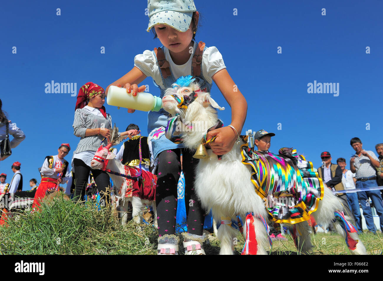 Hami, China's Xinjiang Uygur Autonomous Region. 8th Aug, 2015. A girl ...