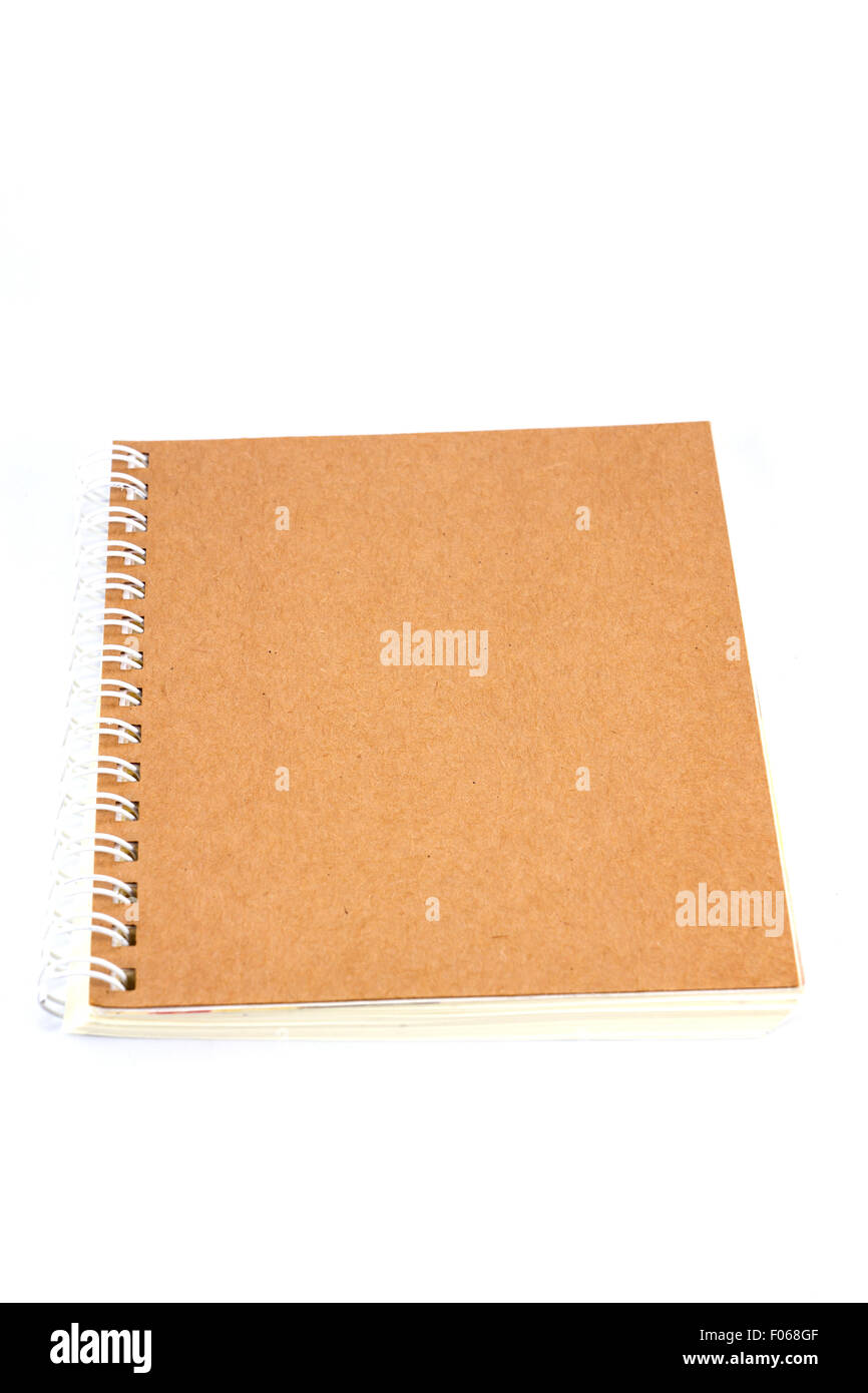 Brown notebook made from recycled on white background Stock Photo - Alamy