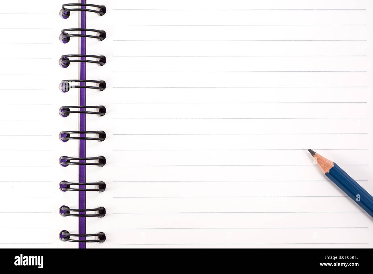 Purple notebook on white background and pencil Stock Photo - Alamy