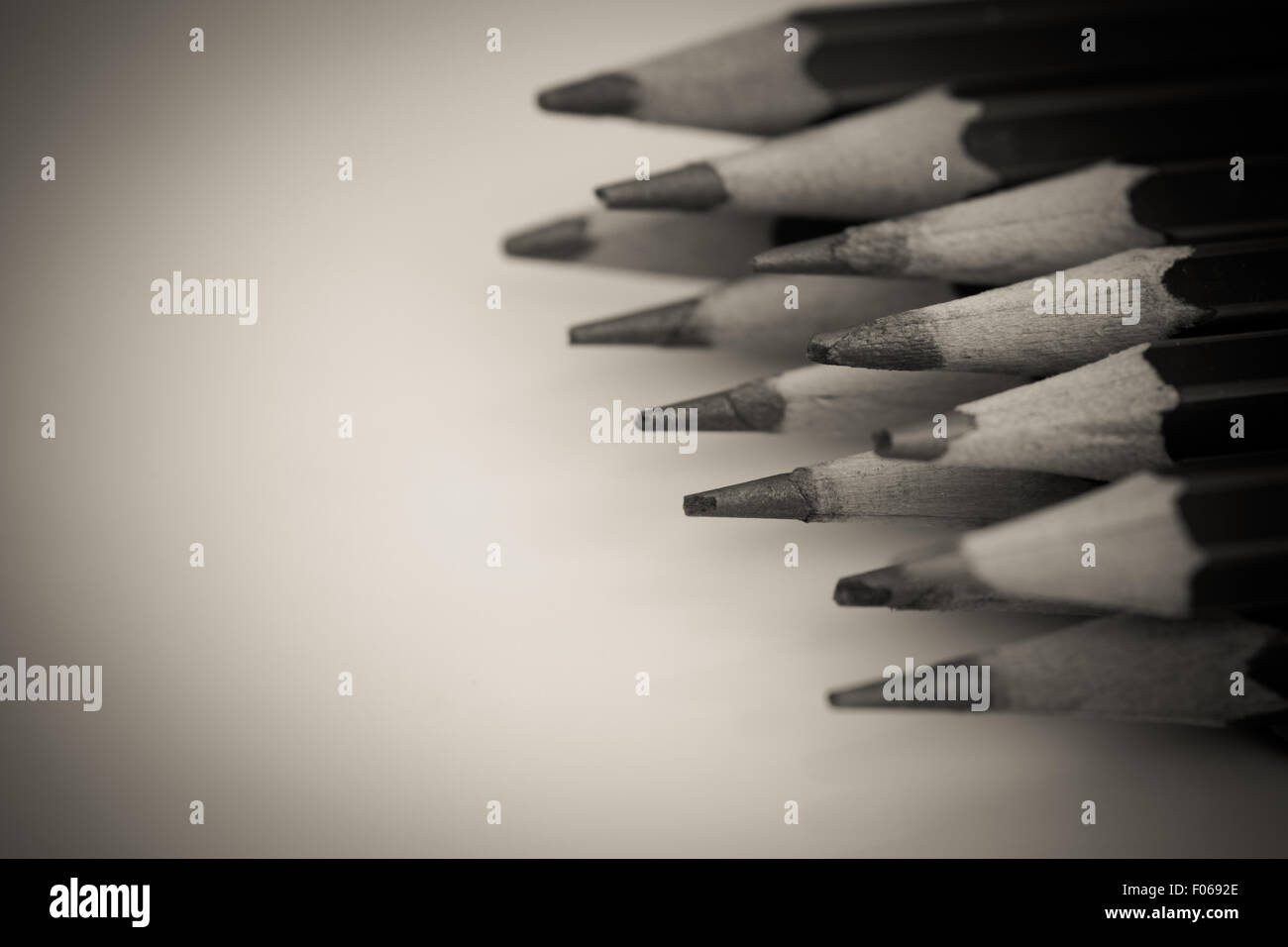 pencils in a box on a white table Stock Photo - Alamy
