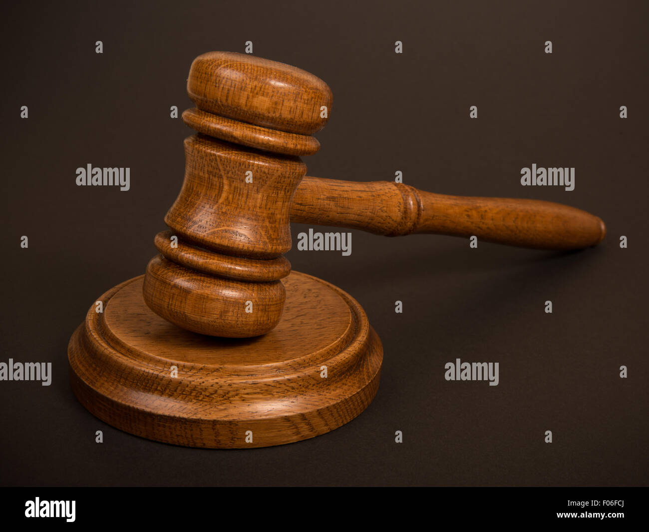 Wooden brown Judges gavel or auction hammer Stock Photo - Alamy