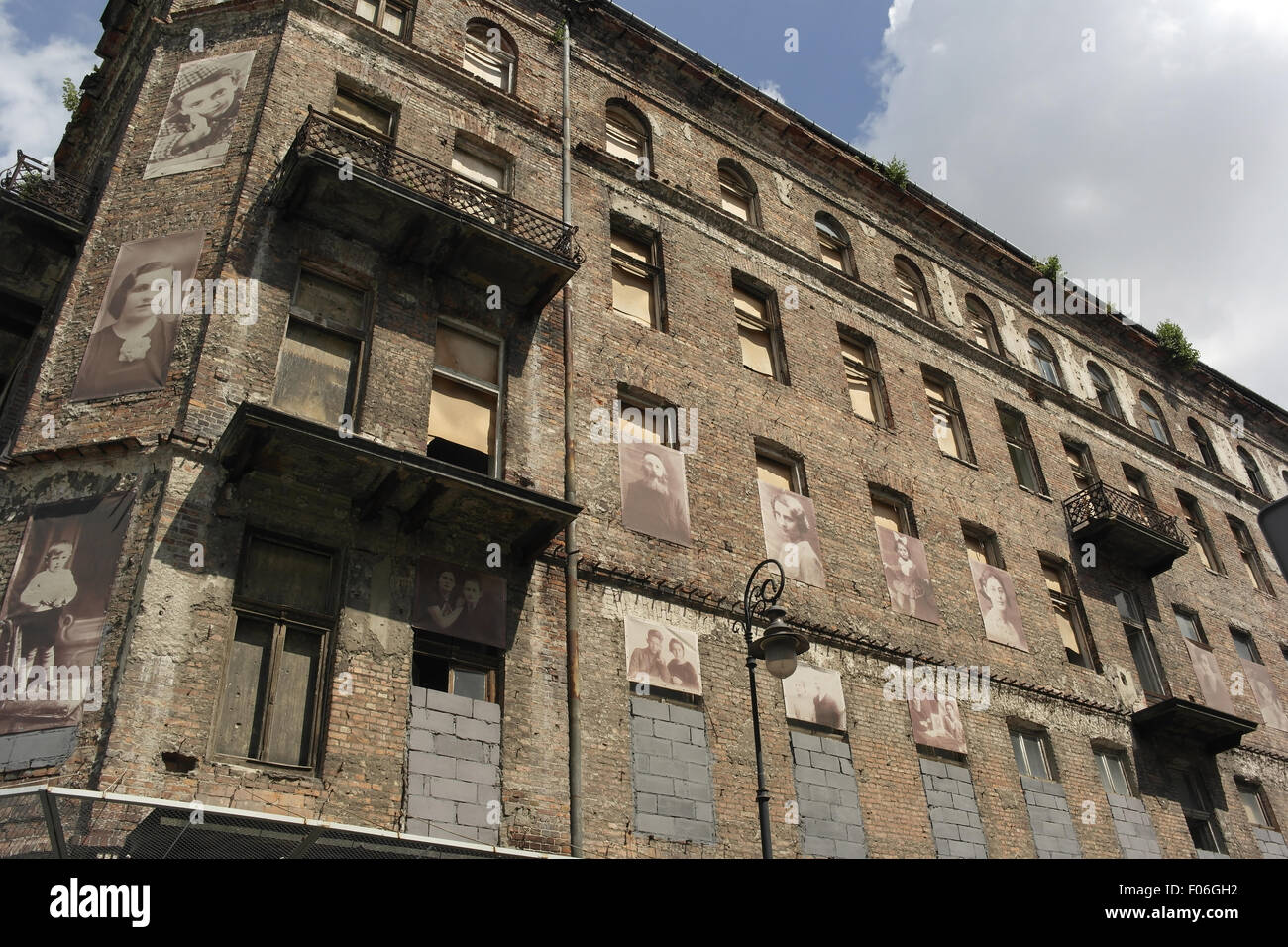 Blue grey clouds oblique view pre-war building 14 Prozna Street with ...
