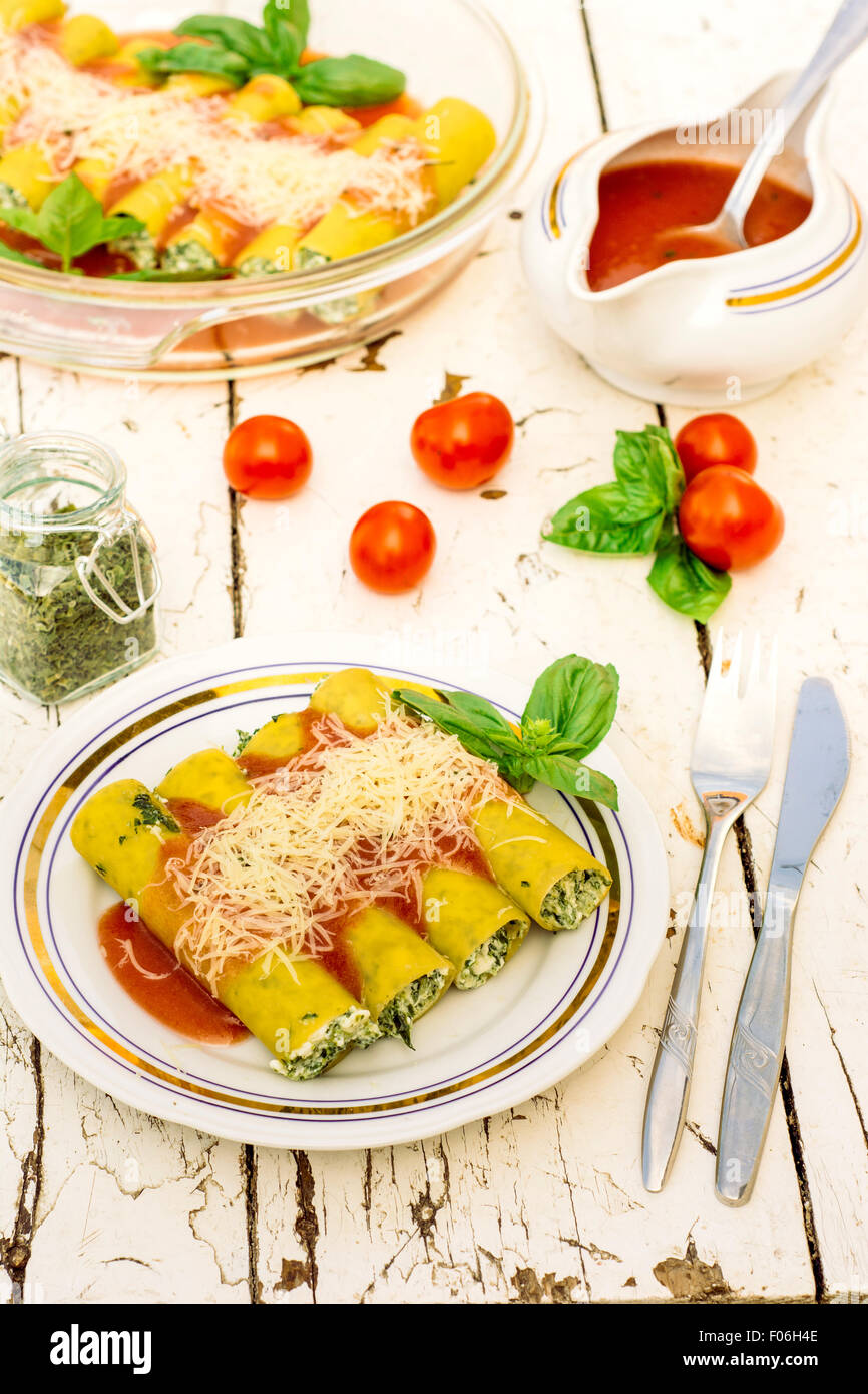 Vegetarian stuffed cannoli with cheese and spinach,selective focus ...