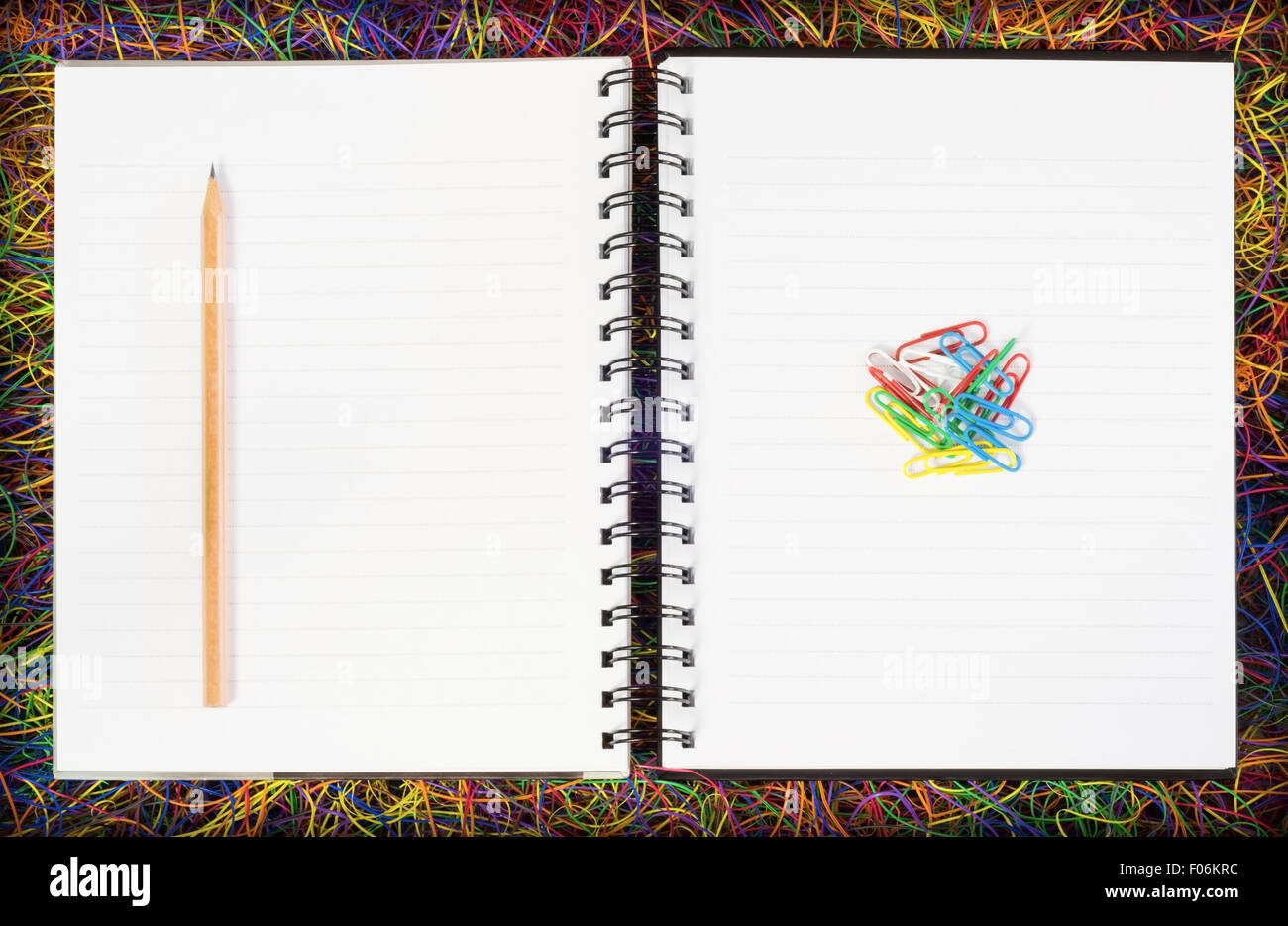 Blank spiral notepad notebooks on electric wire Stock Photo - Alamy