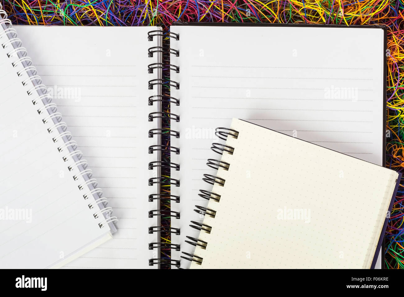 Blank spiral notepad notebooks on electric wire Stock Photo - Alamy