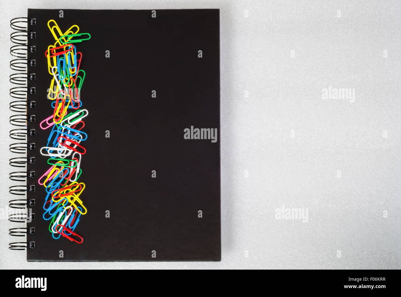 Blank spiral notepad notebooks on electric wire Stock Photo - Alamy