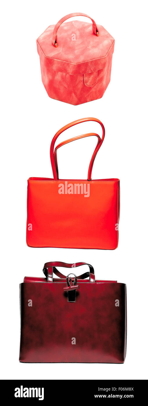 Three red womans bags isolated on white background Stock Photo - Alamy