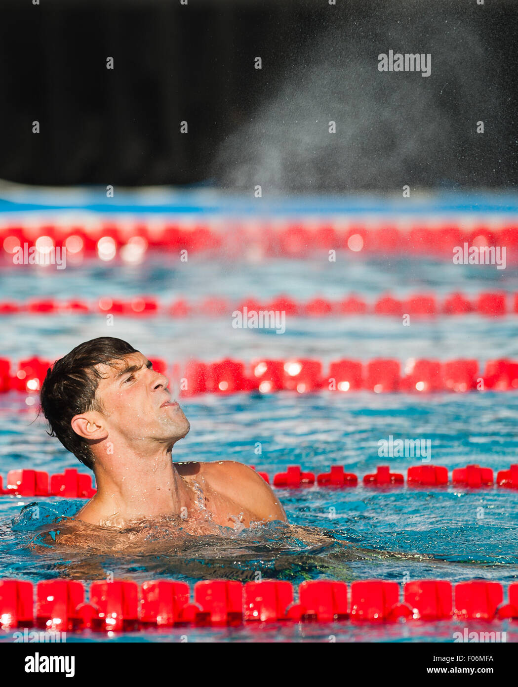 Michael Phelps reacts after winning the Final of the 100m Butterfly ...
