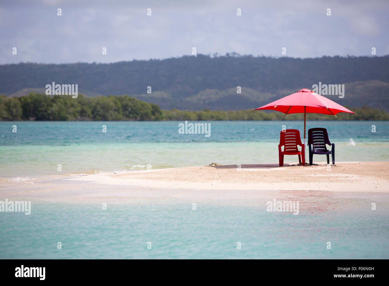 Two chairs and umbrella on stunning tropical beach in Morrocoy National ...