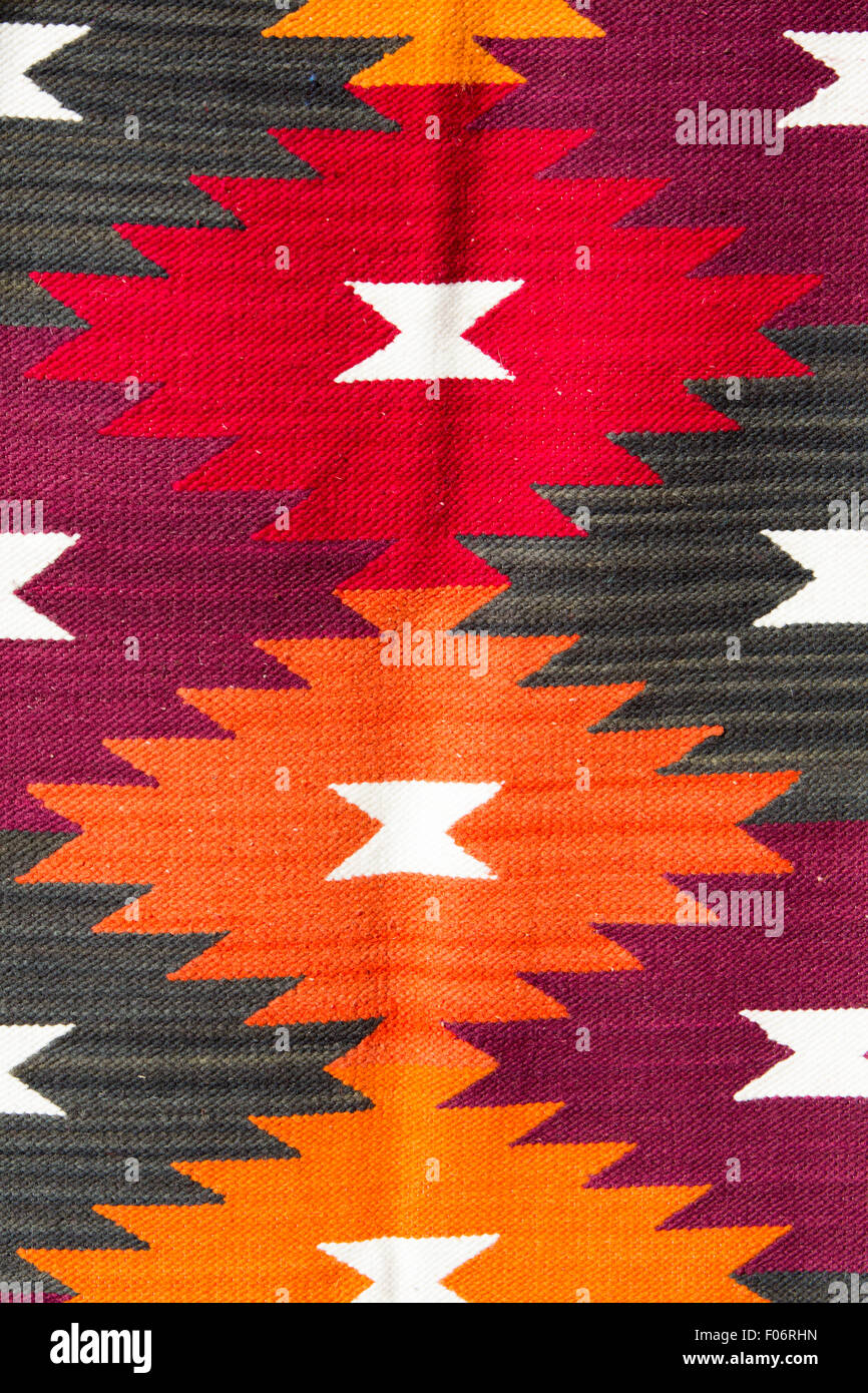 Background of colored Ecuadorian textile at the market of Otavalo in ...