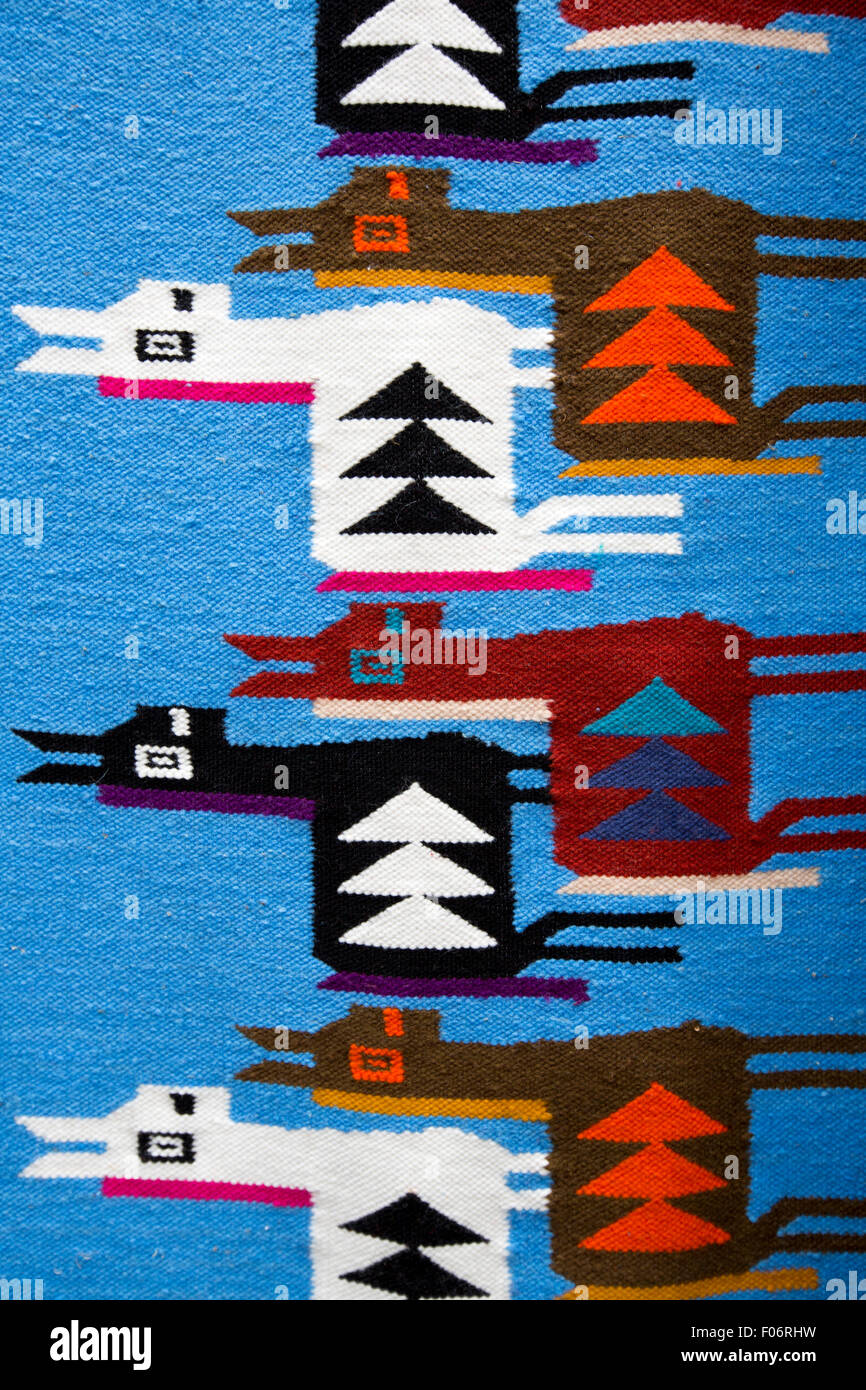 Background of colored Ecuadorian textile at the market of Otavalo in ...